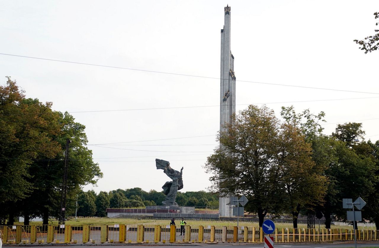 Soviet-era monument's iconic obelisk comes down in Latvia