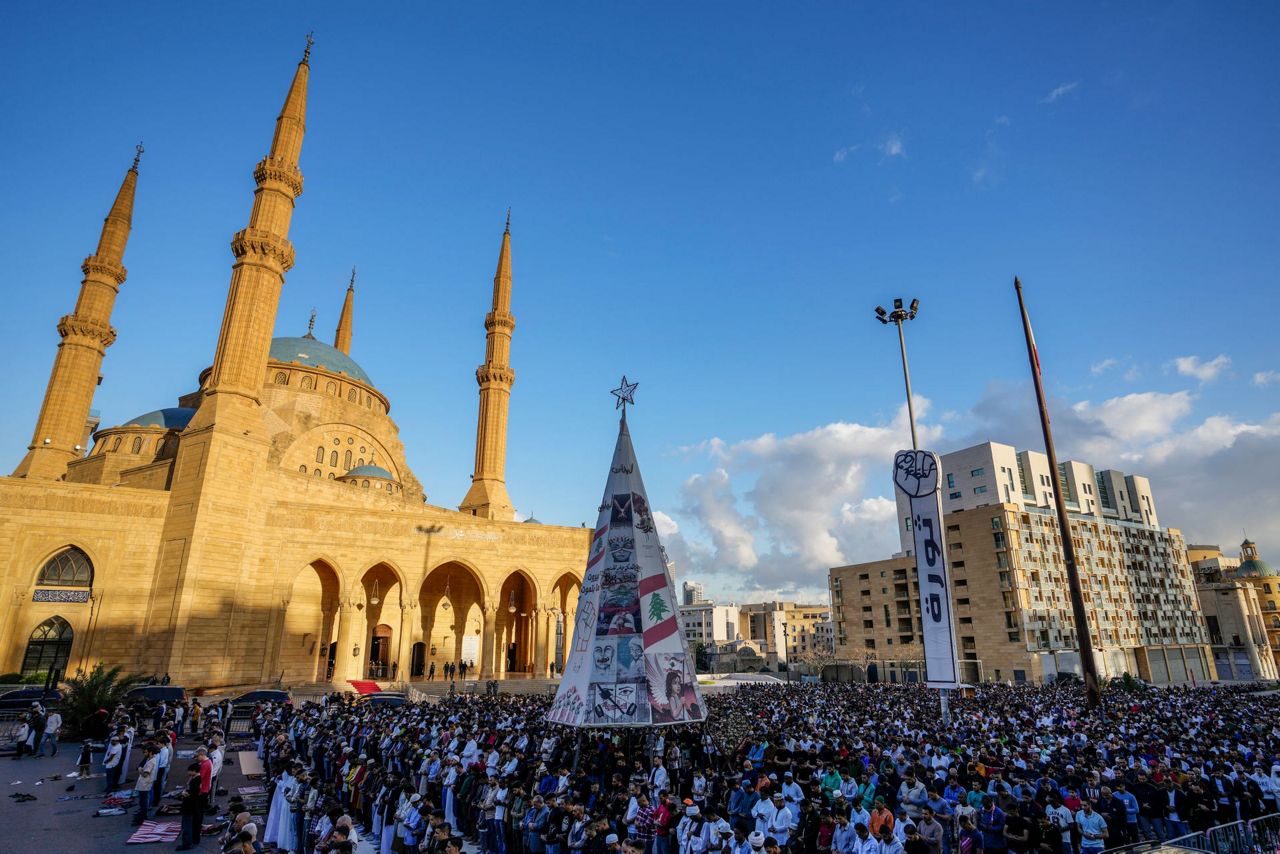 Amid joy and tragedy, Muslims celebrate Eid al-Fitr holiday