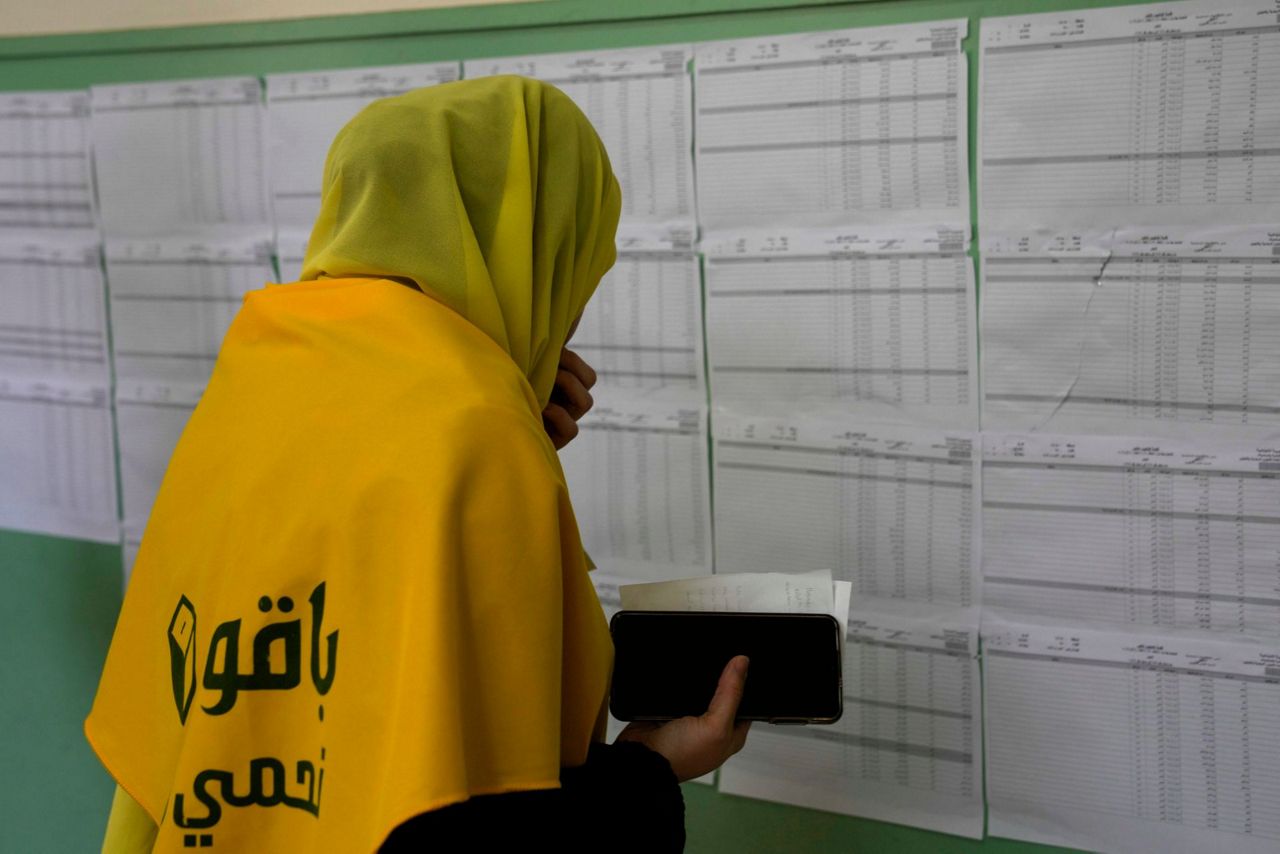 Mired in crises, Lebanese begin voting for new parliament