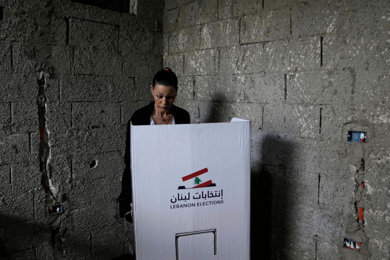 Mired in crises, Lebanese begin voting for new parliament