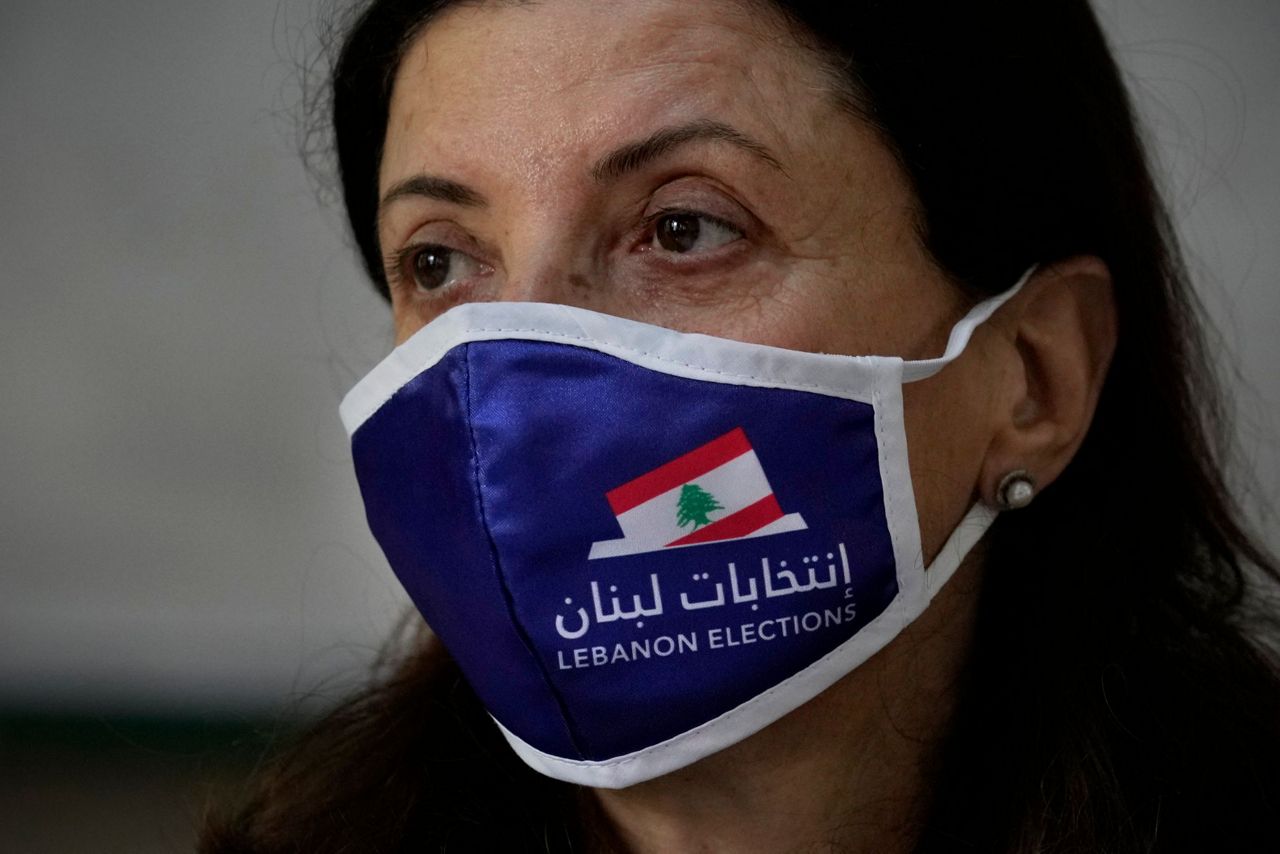 Mired in crises, Lebanese begin voting for new parliament