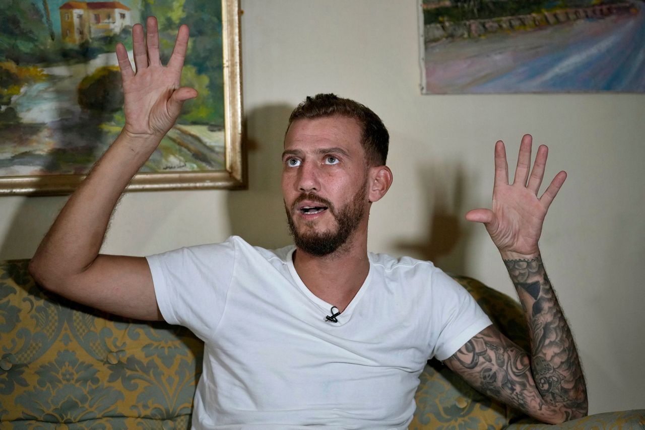 'Don't leave me': Survivor recounts Lebanon boat sinking