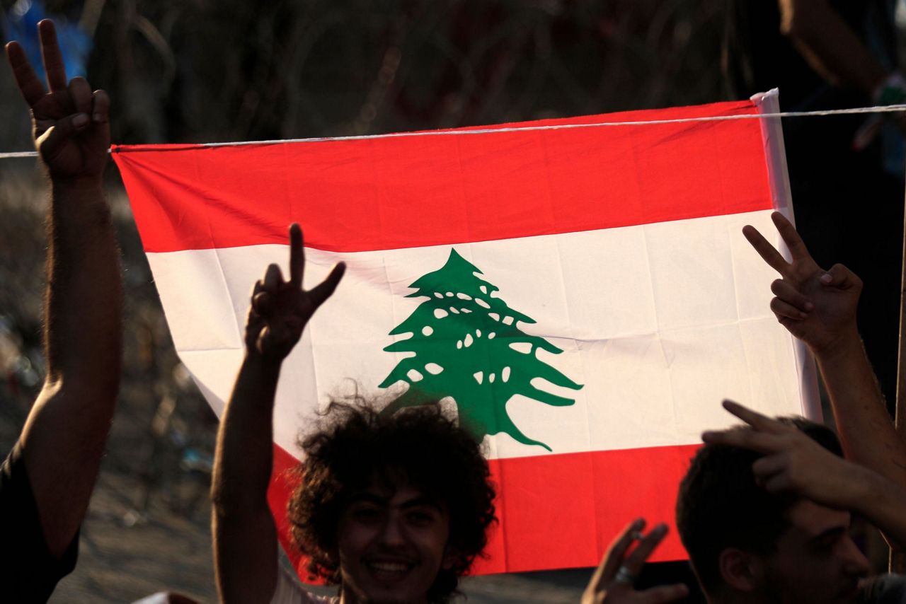 Lebanese protesters dig in, even after proposed reforms