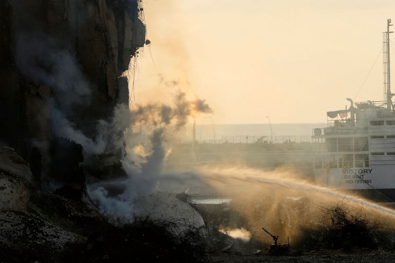 Smoldering Beirut port silo risks total collapse amid fire