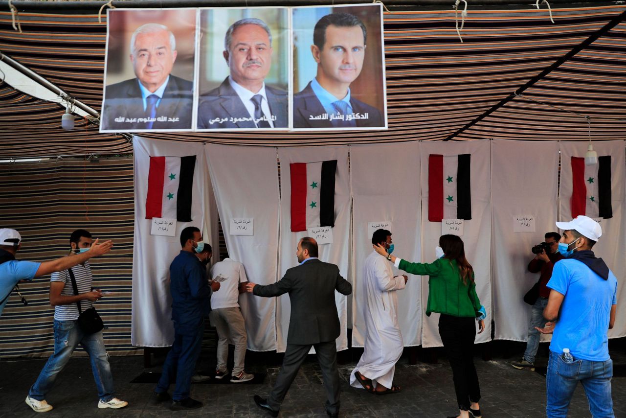 Syrians cast early ballots in symbolic presidential vote