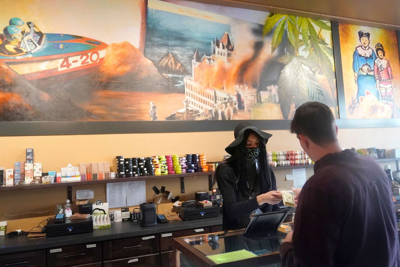 Uneasy marijuana industry seeks broader trade amid vast glut