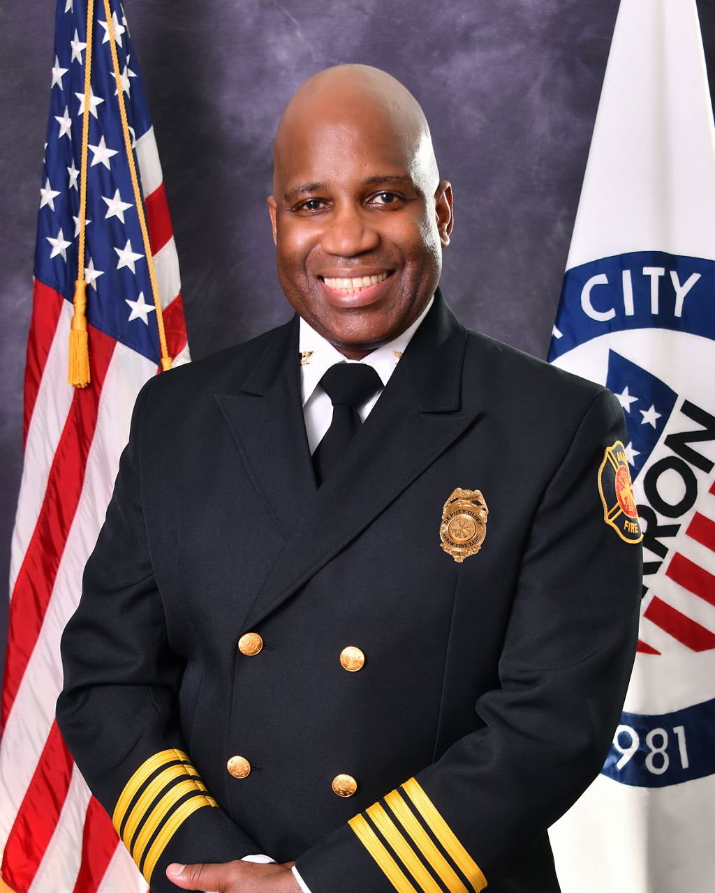 Akron swears in new fire chief Leon Henderson