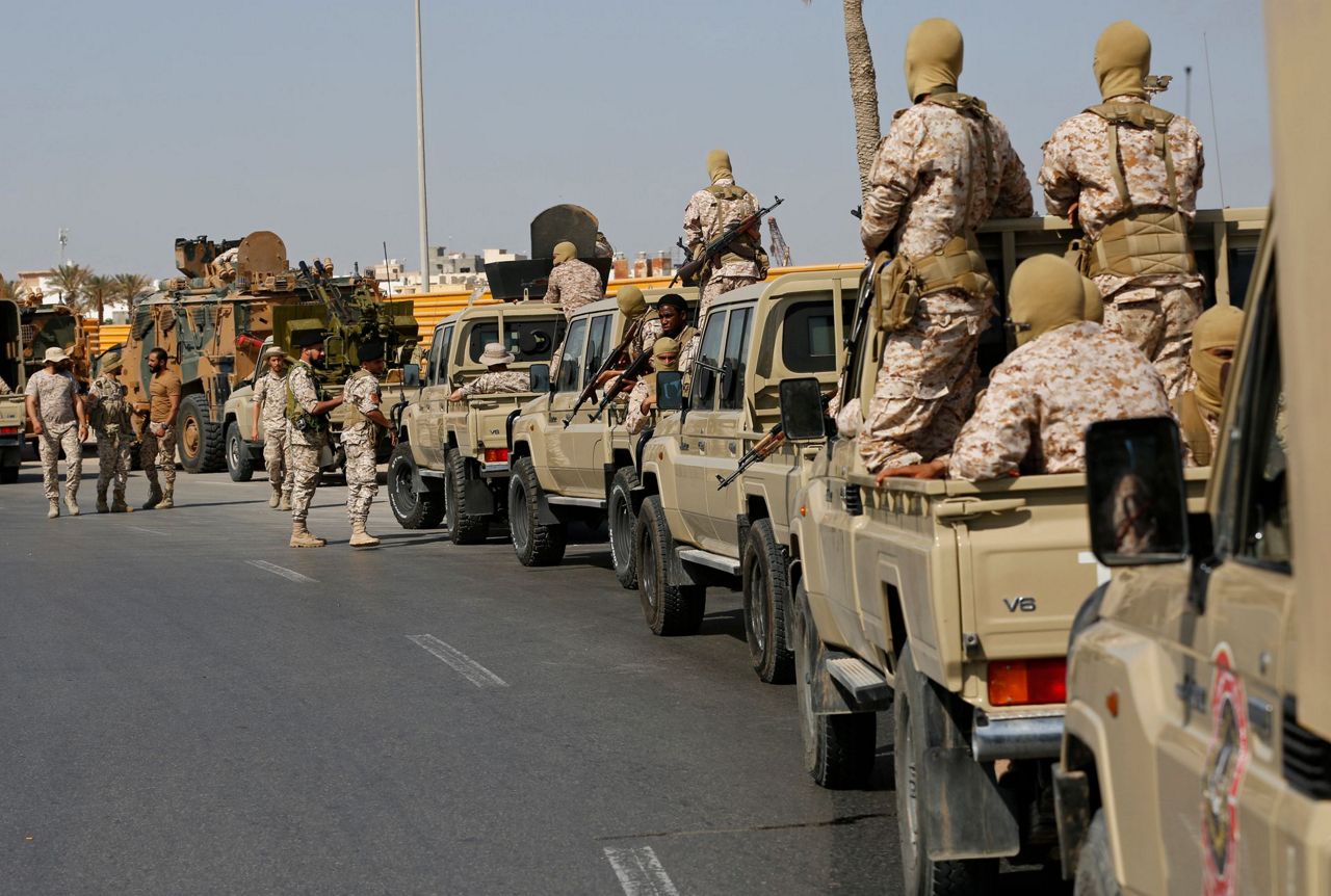 Rival Libyan PM arrives in Tripoli from east to seat Cabinet