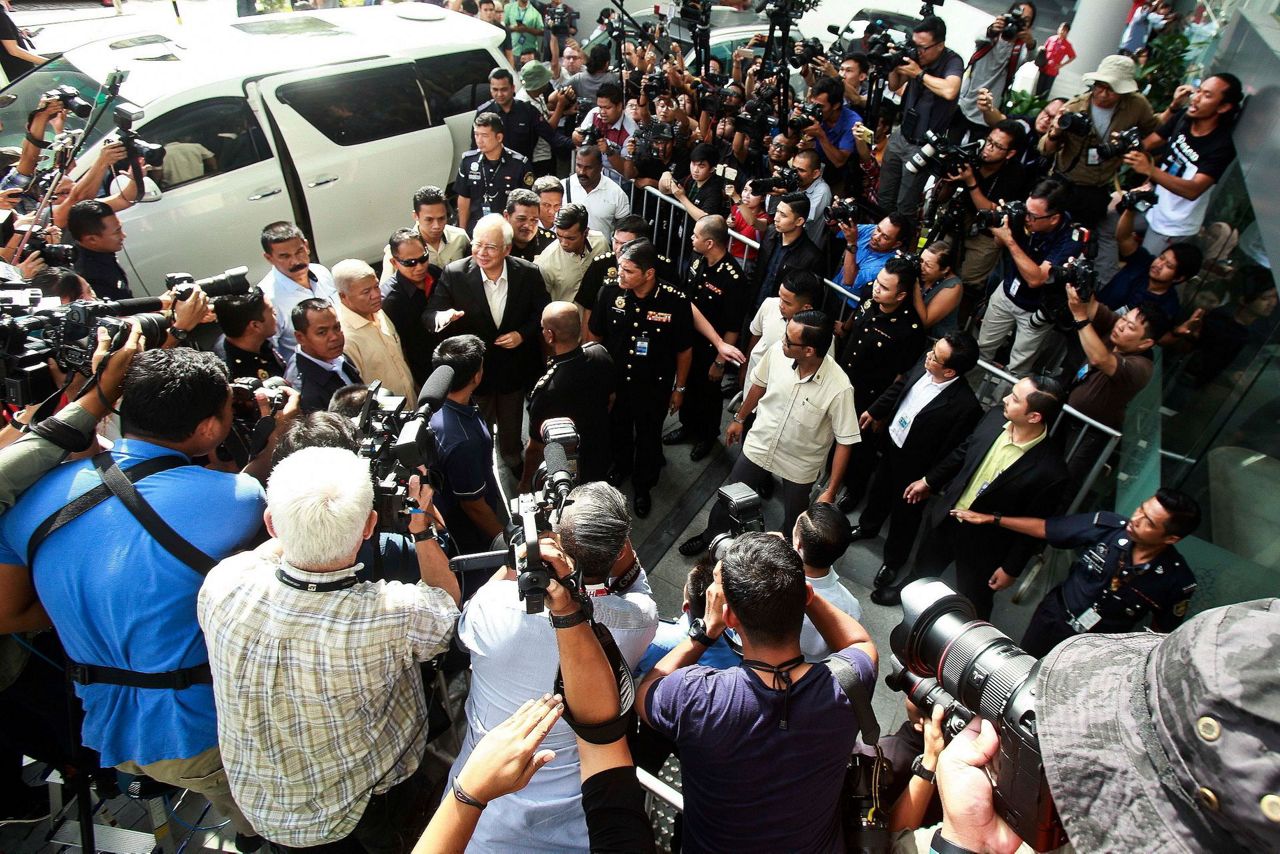 Malaysia's ex-leader questioned again in corruption scandal