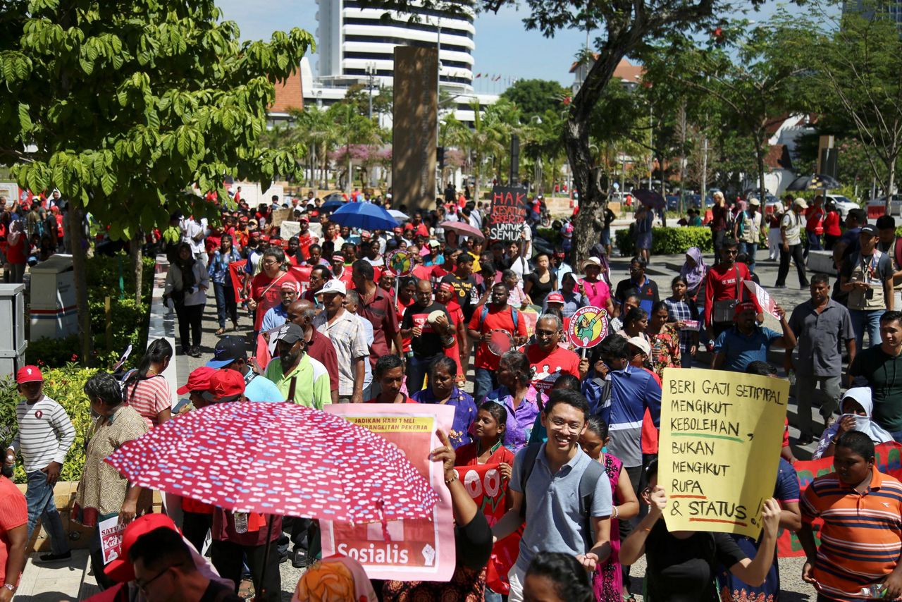 Thousands march on May Day, demand better working conditions