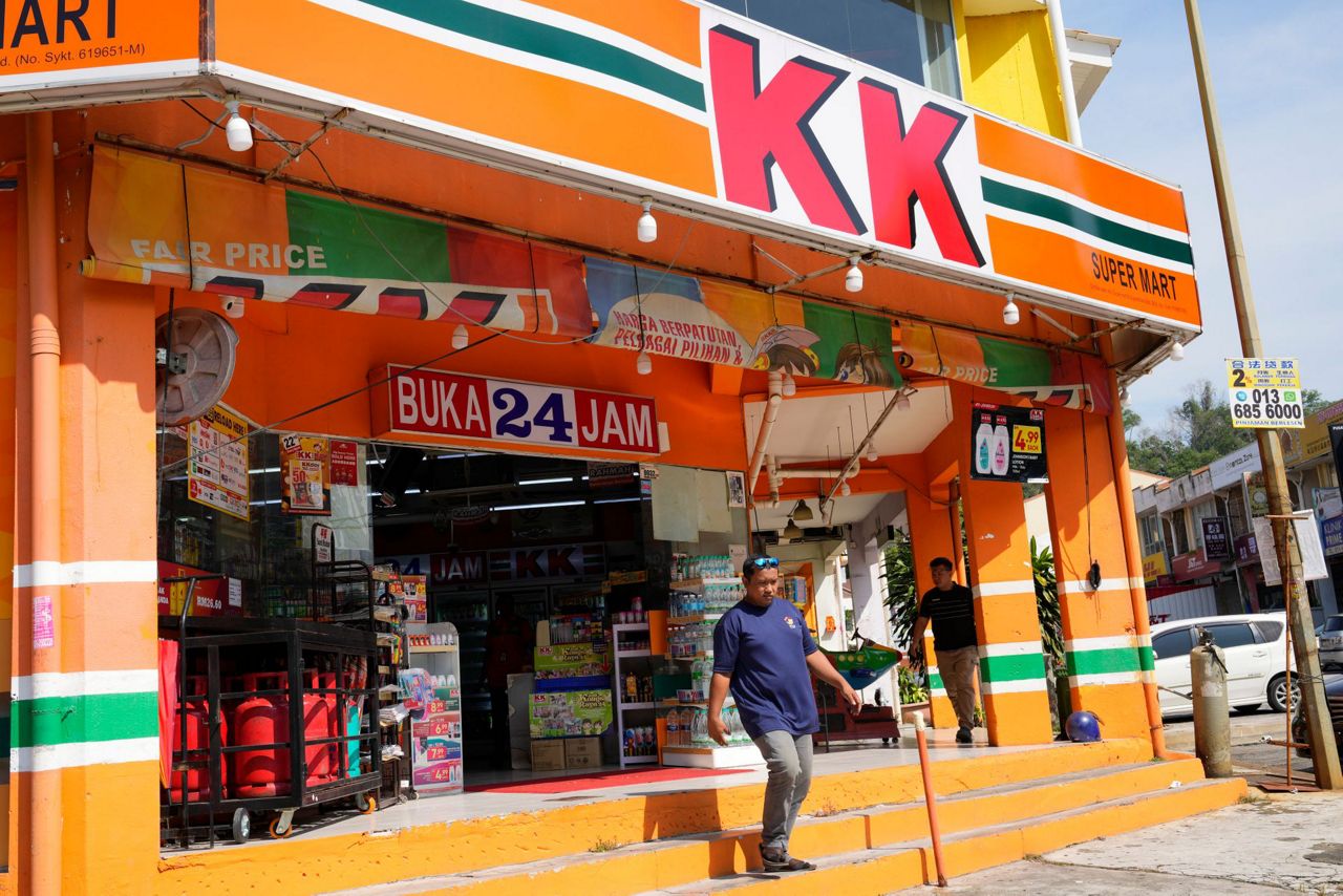 Malaysian convenience store owners charged over 'Allah' socks that ...