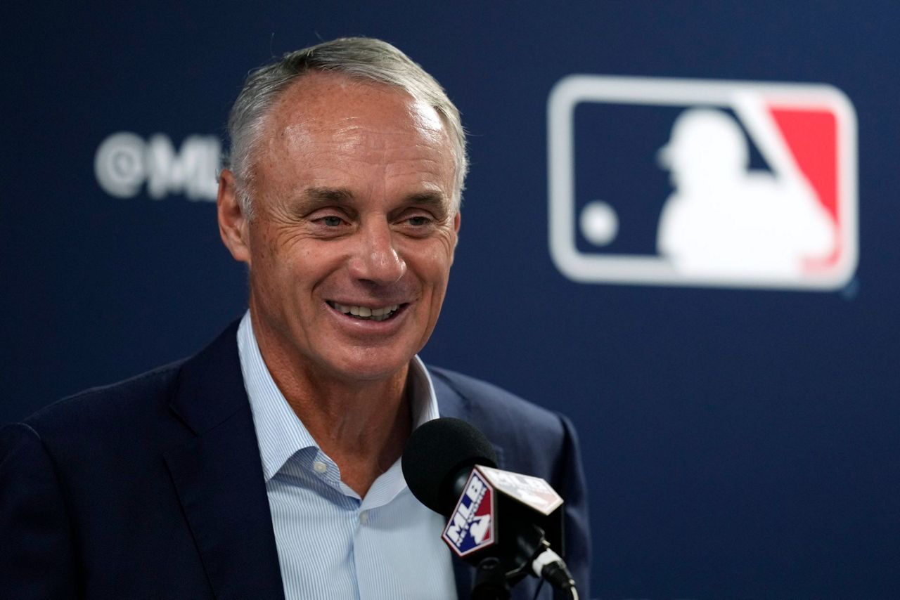 Rob Manfred says he will retire as baseball commissioner in January ...