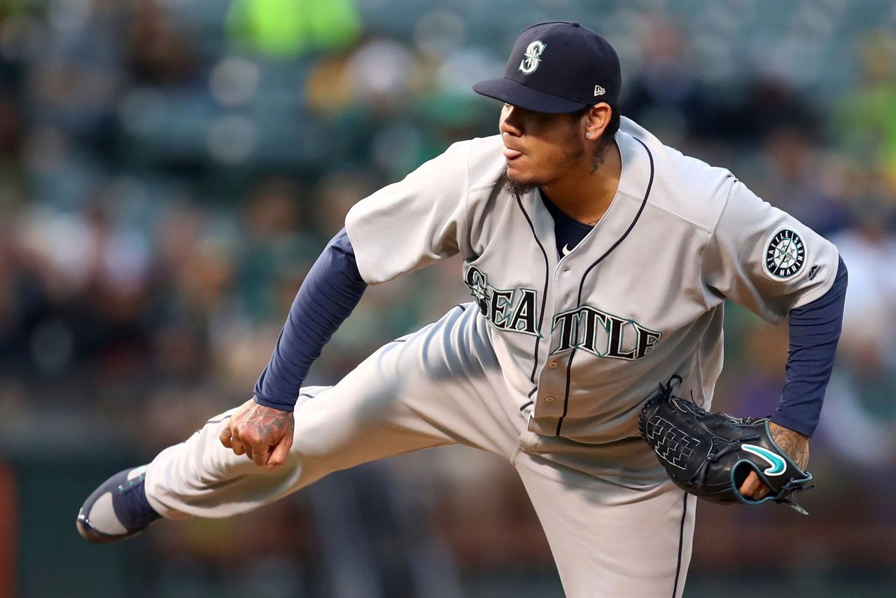 A's edge Mariners to pull within 1 game of 1st in AL West