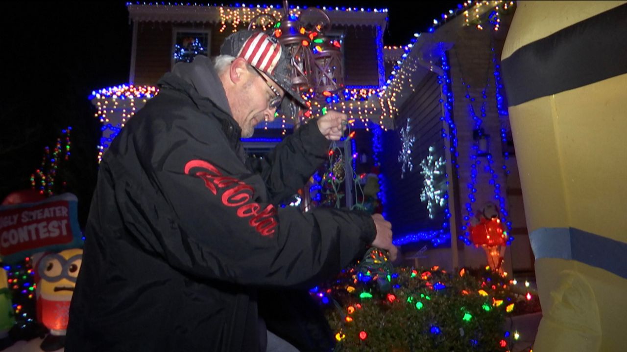 KY man decks out his house and neighbor's for Christmas