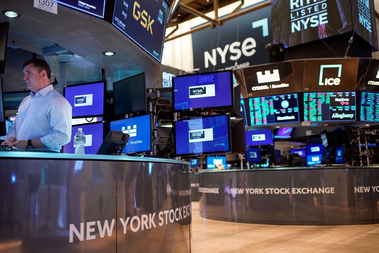 Global stocks mixed ahead of US GDP, Europe rates decision