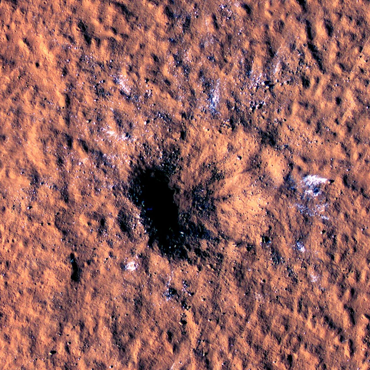 Space rock slams into Mars and reveals buried ice | CNN