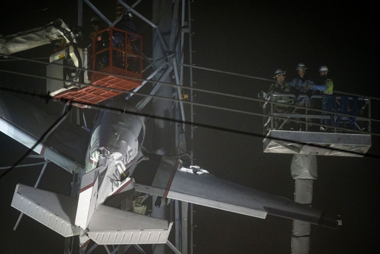 2 rescued after plane hits transmission tower in Maryland