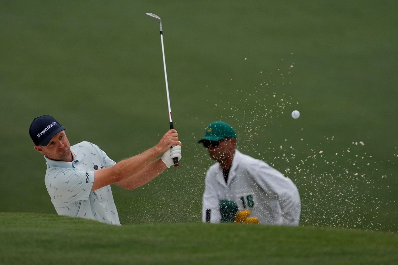 The Latest: Elder raises driver in honorary start at Masters