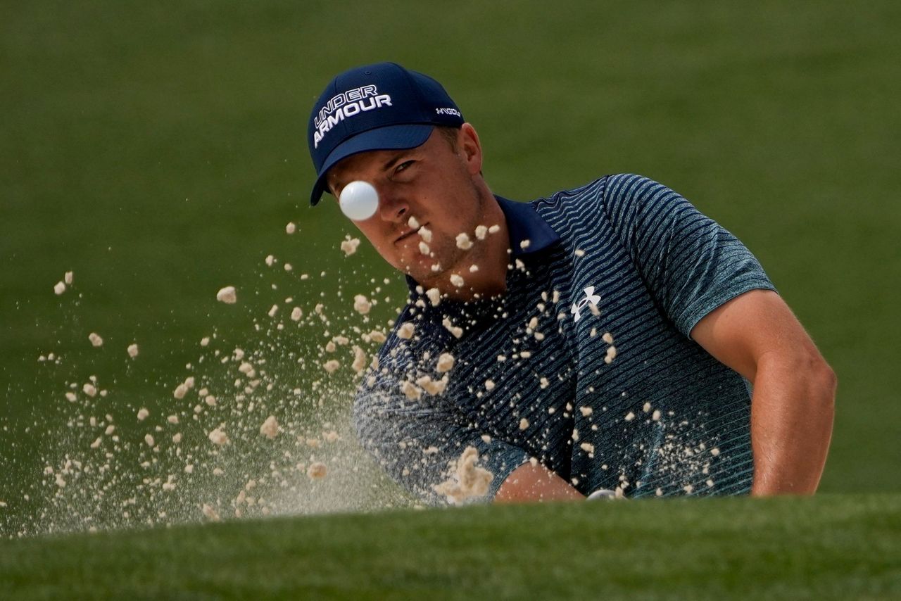 The Latest: Elder raises driver in honorary start at Masters