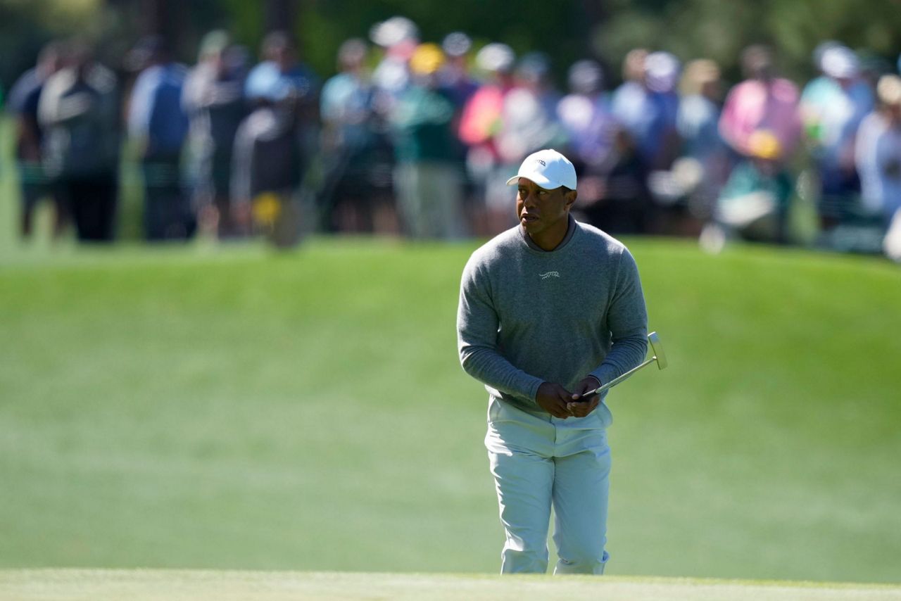 Tiger Woods completes opening round at Masters with a 73, eight shots ...