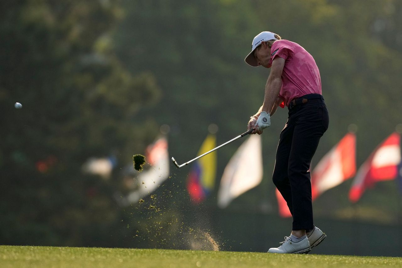 The Latest: Elder raises driver in honorary start at Masters