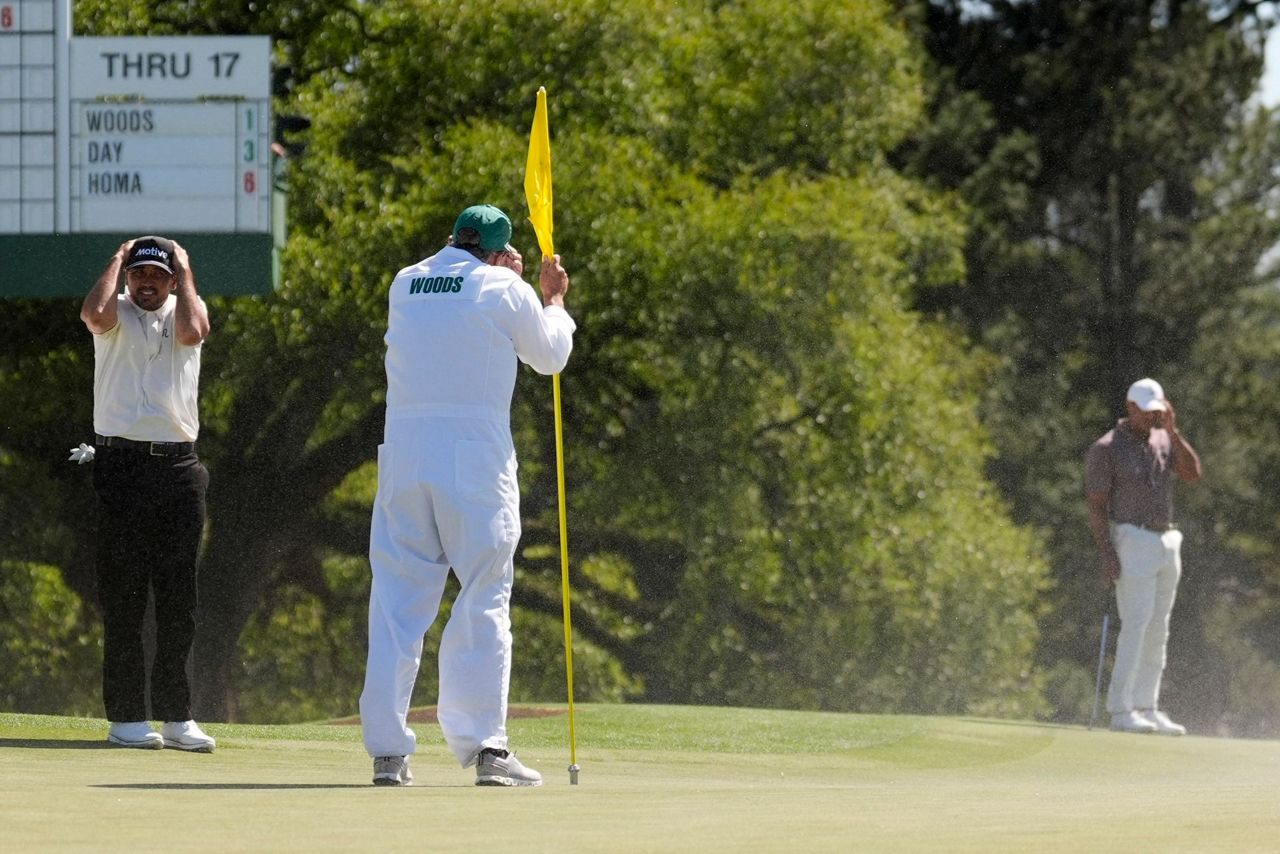 Tiger Woods completes opening round at Masters with a 73, eight shots ...