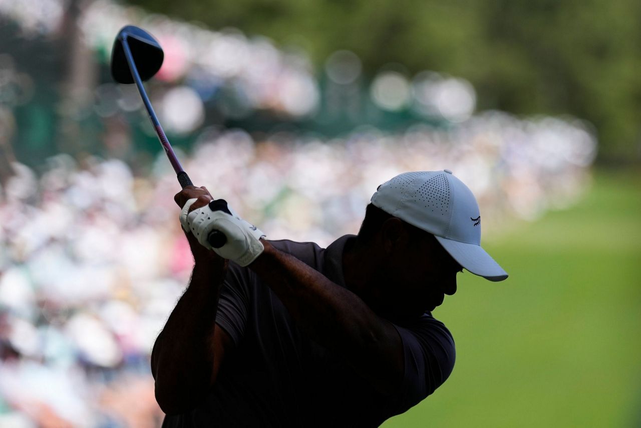 Tiger Woods completes opening round at Masters with a 73, eight shots ...