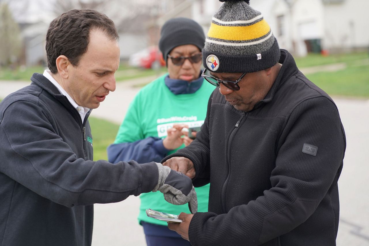 Louisville mayor's race plays out amid lingering tensions