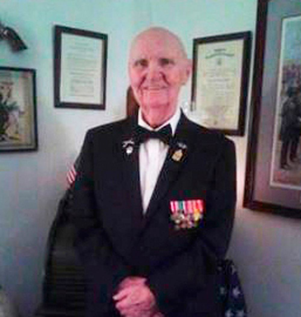 Nurse charged in death of former Trump adviser's father