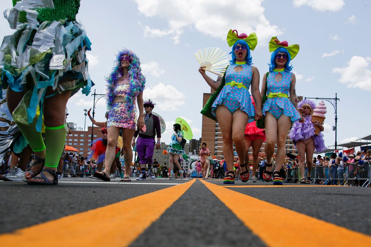 Woody Guthrie's children named Mermaid Parade king and queen