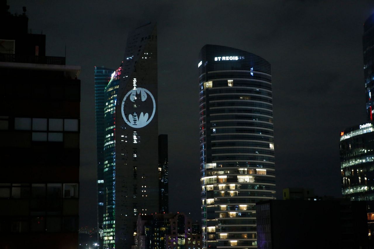Holy anniversary! Displays of bat signal fete Batman at 80