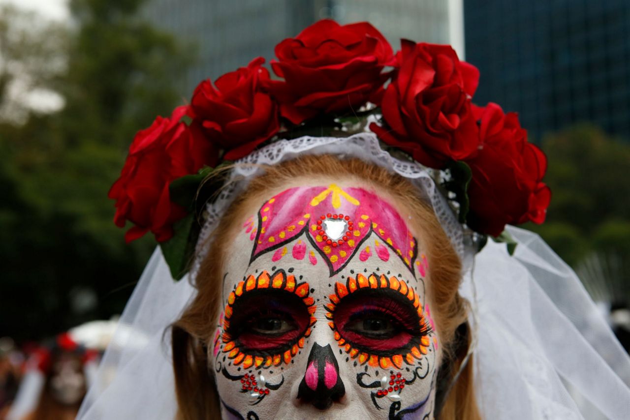 Mexicans parade as fancy skeletons ahead of Day of the Dead