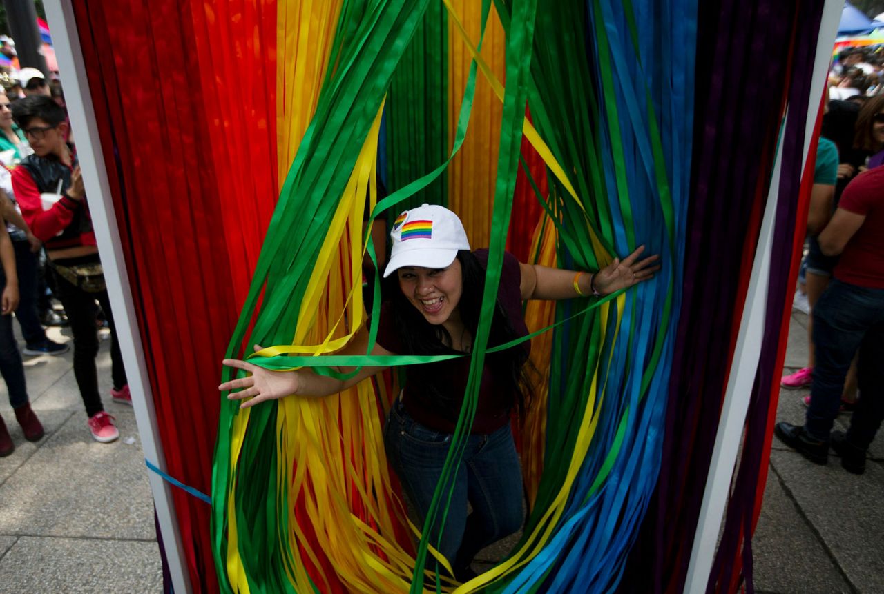 Thousands join gay pride parades around the world