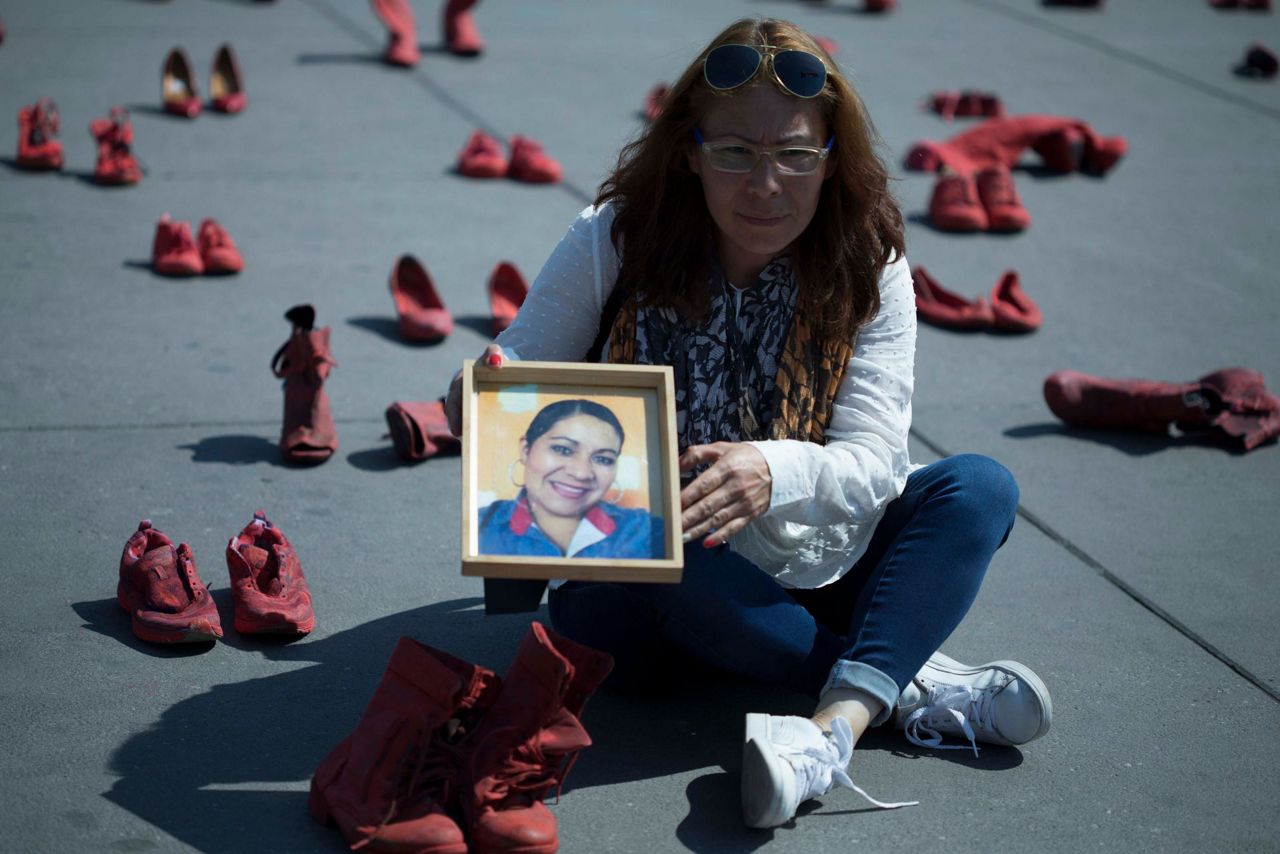 In Mexican capital, red shoes to protest killings of women