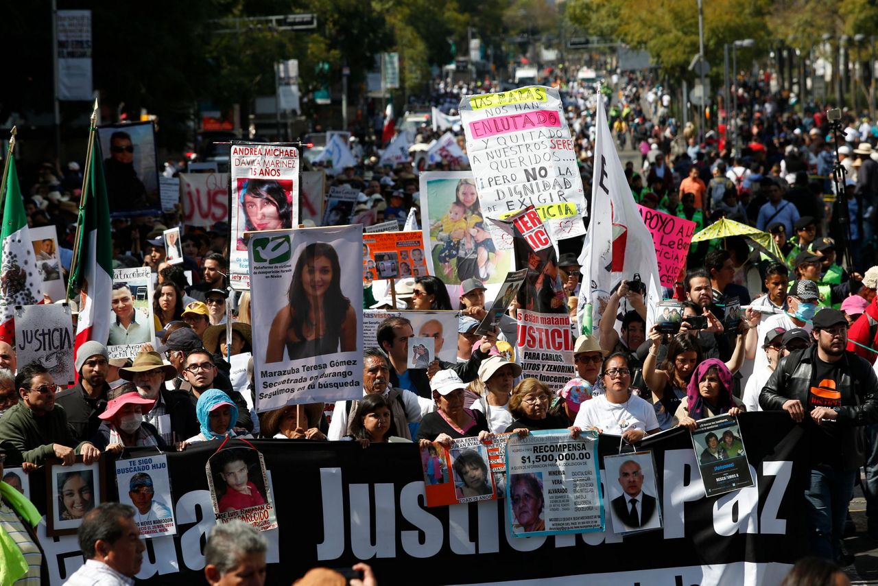 Mexican march for peace swarmed by angry protesters