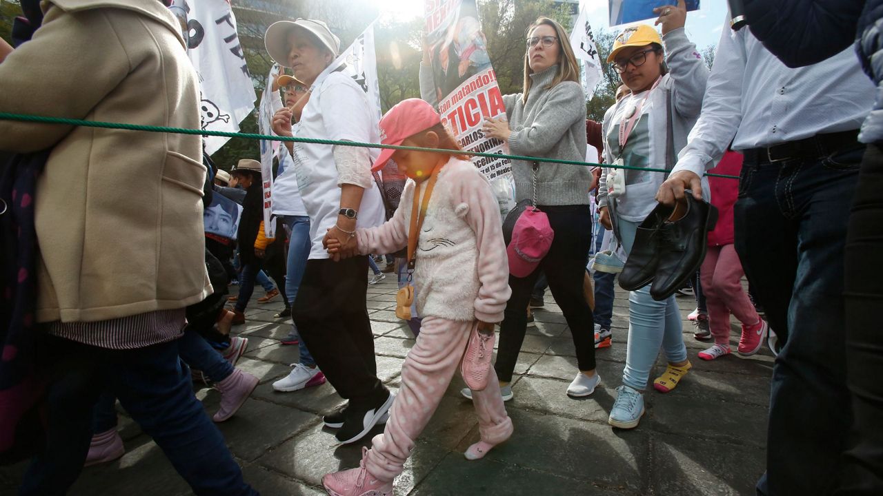 Mexican march for peace swarmed by angry protesters