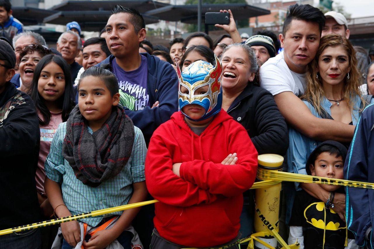 Mexican wrestlers thrill public at historic Metro station
