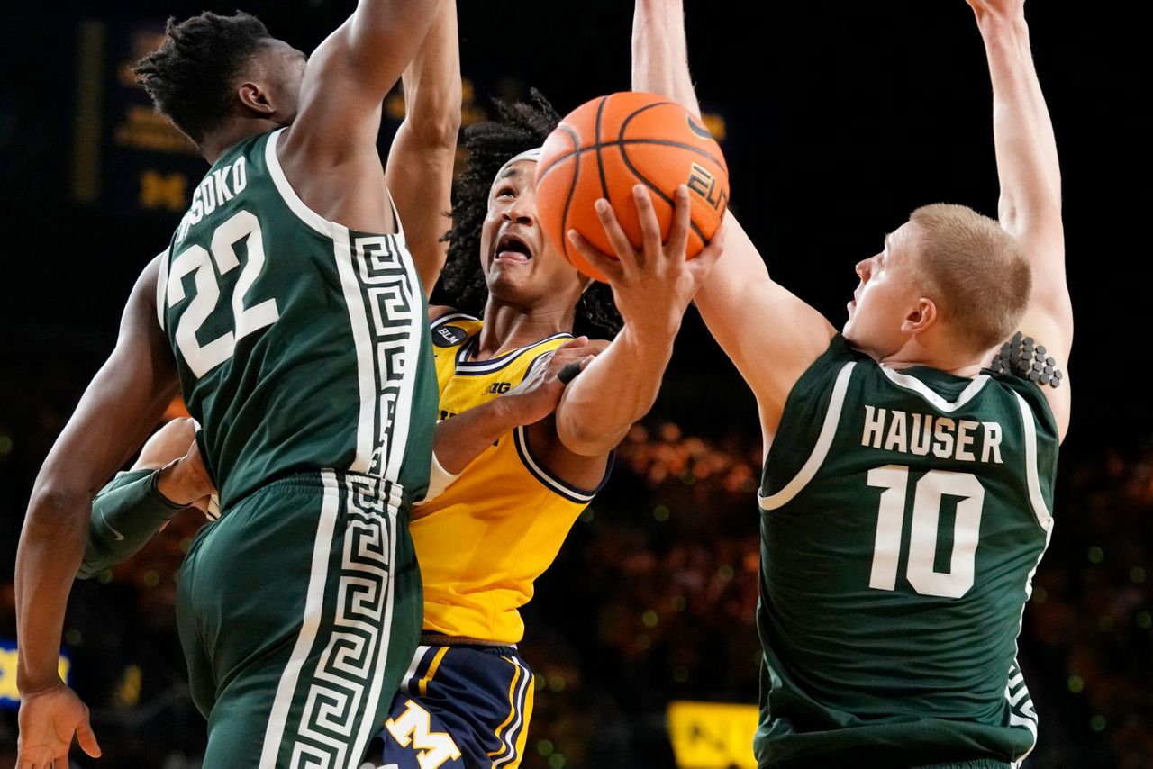 Spartans lose to Michigan in their first game since shooting