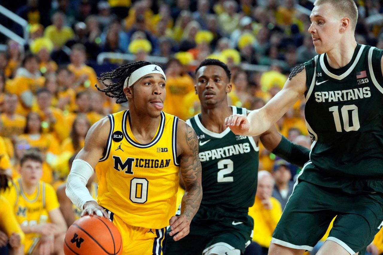 Spartans lose to Michigan in their first game since shooting