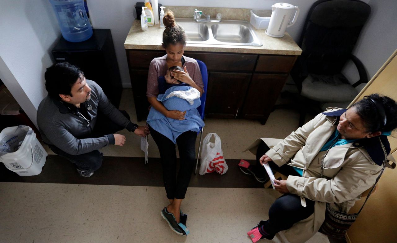 Waves of migrant parents and children enter overtaxed system