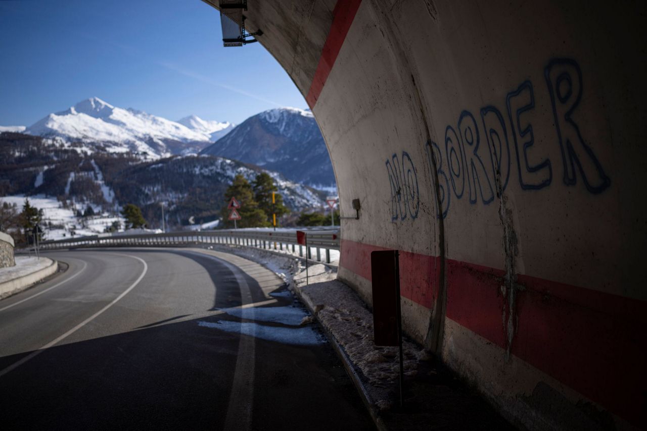 Freezing in the Alps, migrants find warm hearts and comfort