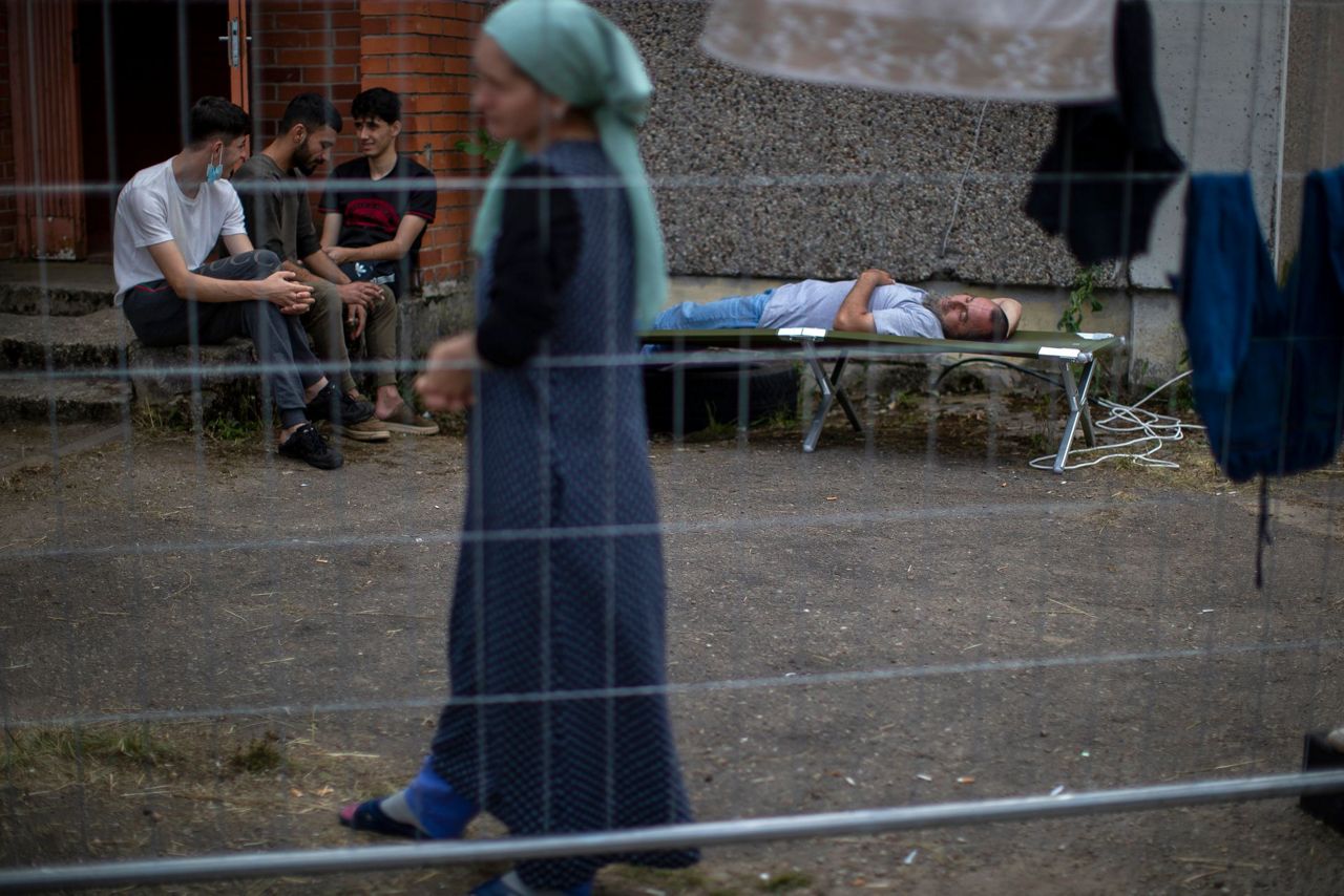 Lithuania struggles with migrant flood opened by Belarus