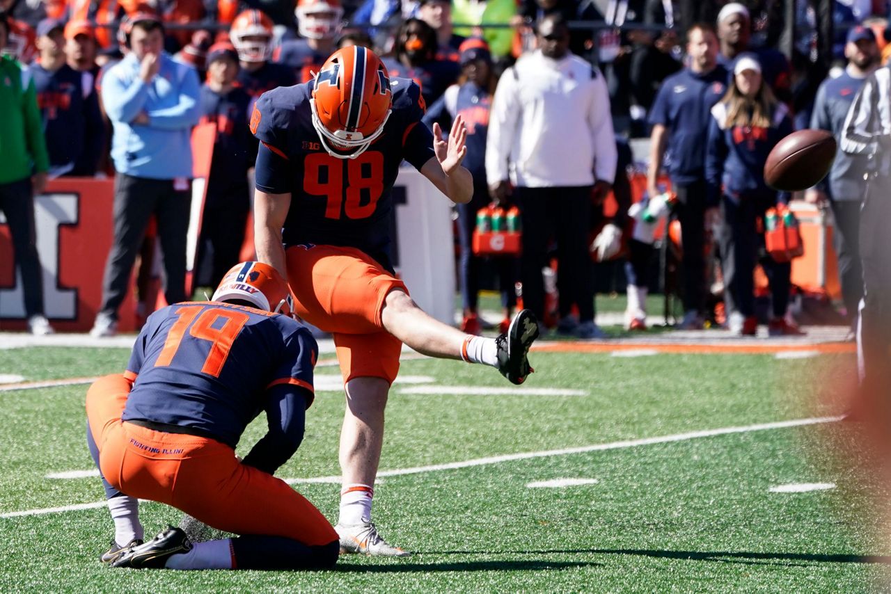 Brown's 180 yards, defense carry No. 24 Illini past Gophers