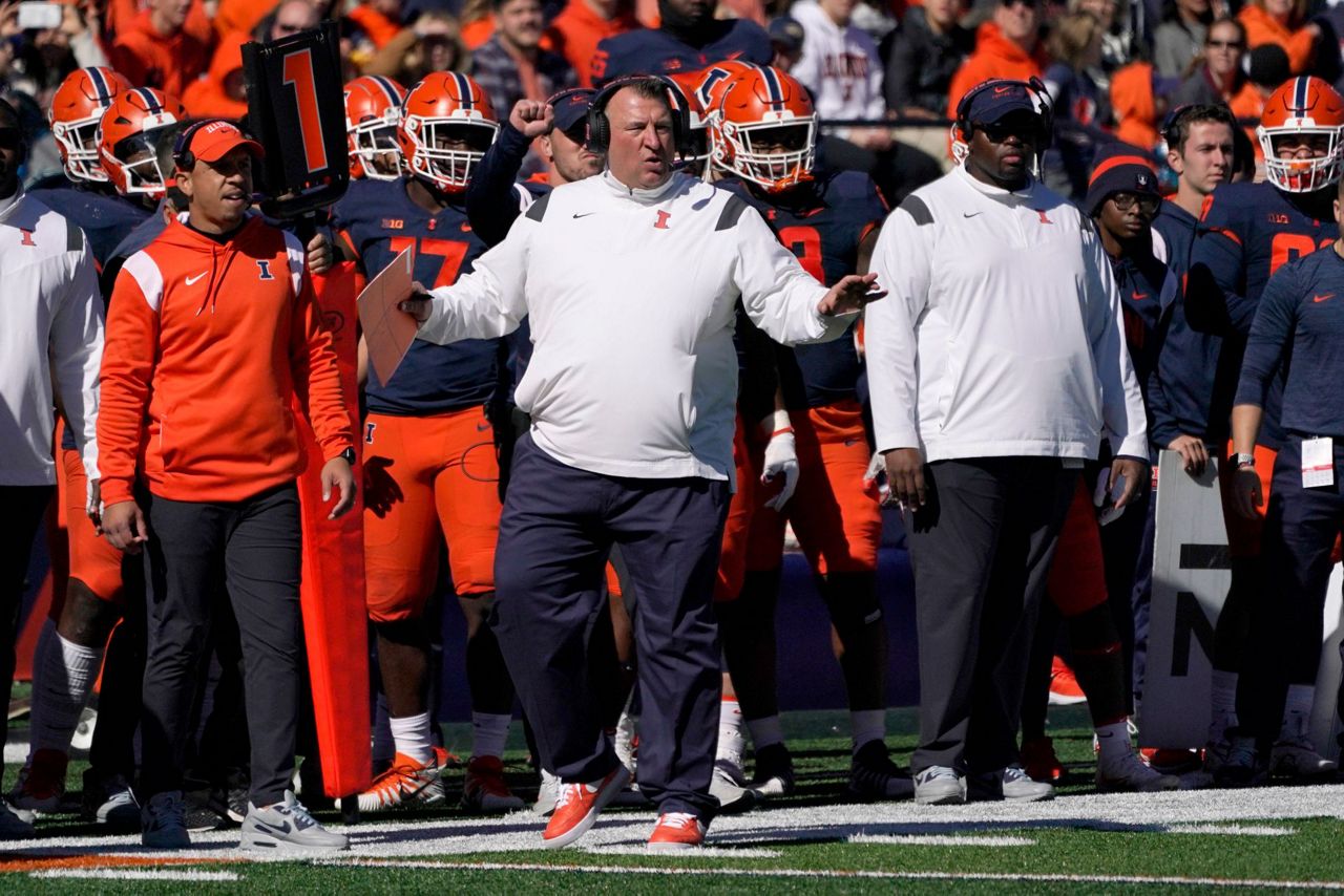 Brown's 180 yards, defense carry No. 24 Illini past Gophers