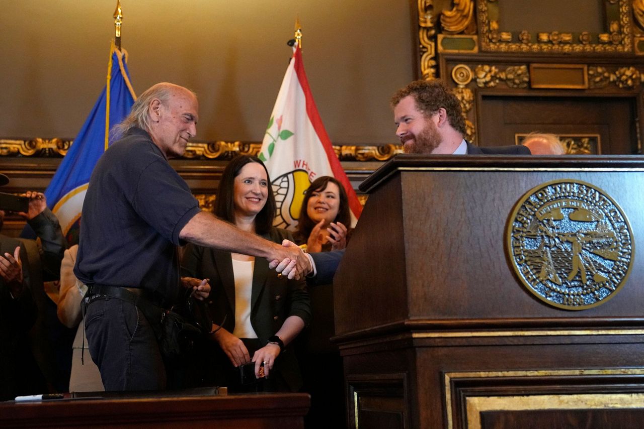 Minnesota governor signs bill to legalize marijuana, effective this summer