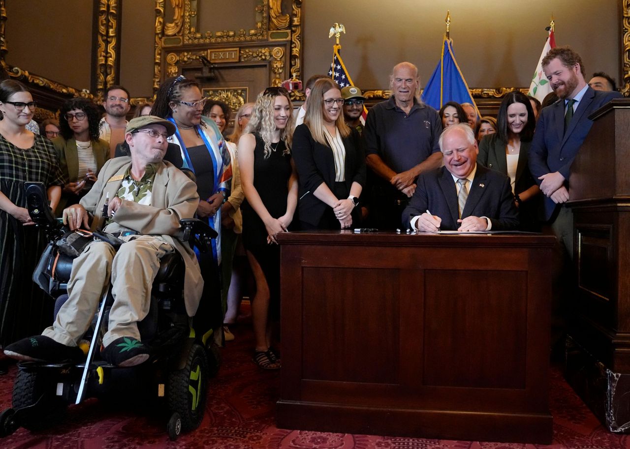 Minnesota governor signs bill to legalize marijuana, effective this summer