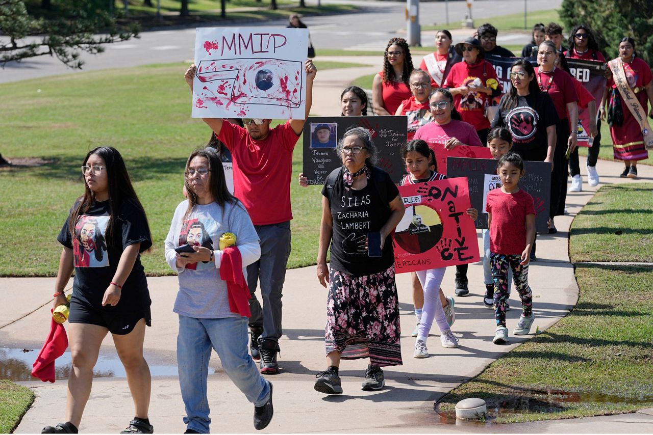 Wearing red, Indigenous families honor missing relatives