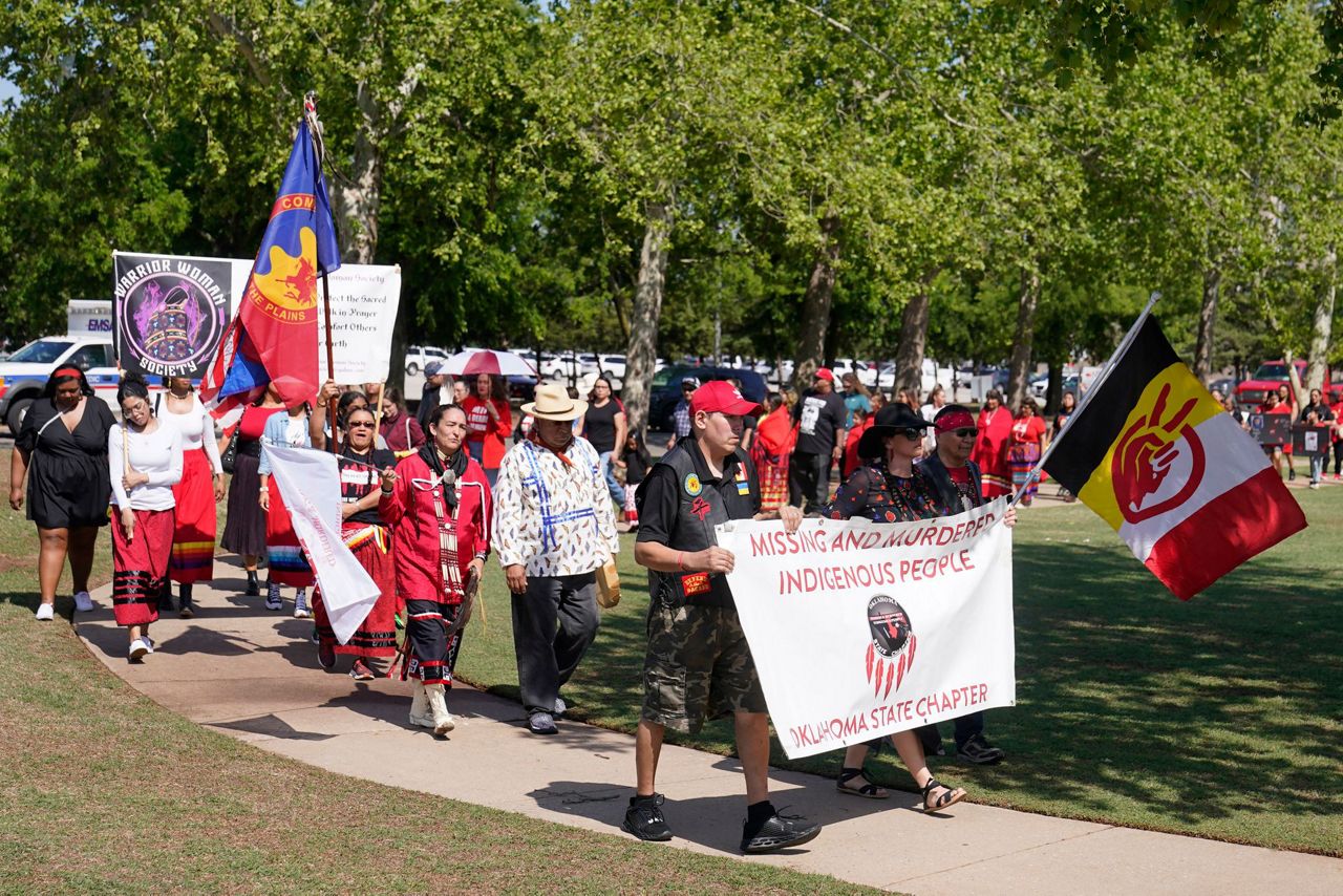 Wearing red, Indigenous families honor missing relatives