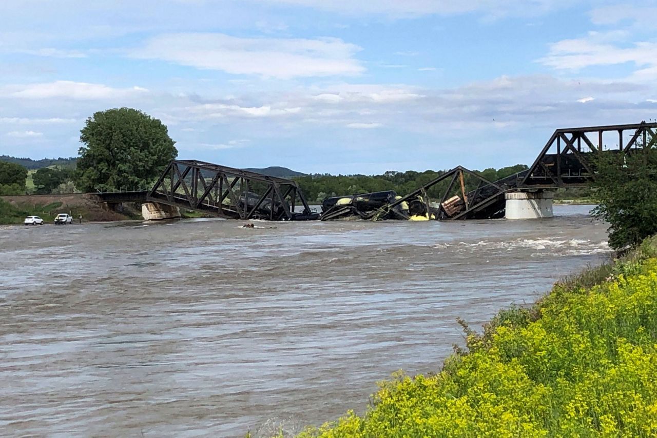 A bridge over Yellowstone River collapses, sending a freight train into ...
