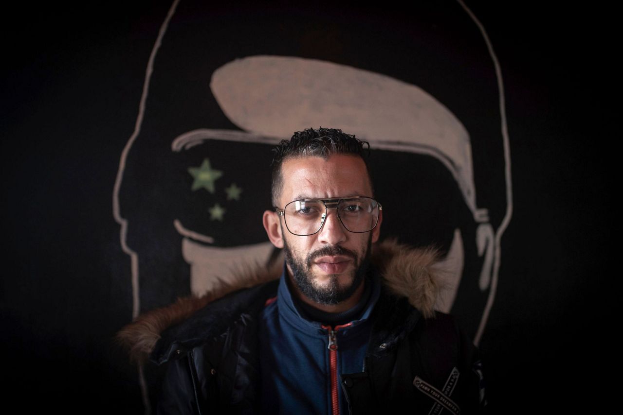 The Latest: Moroccan rapper gets year in prison for video